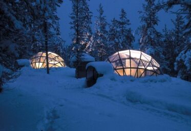 Glass Igloos Under The Northern Lights