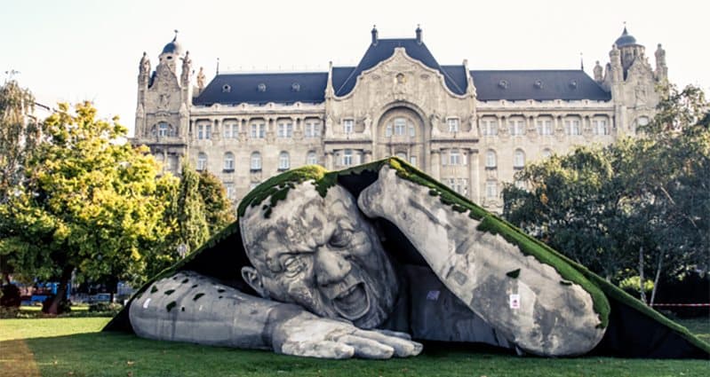 Giant Sculpture Crawls Out Of The Ground In Budapest