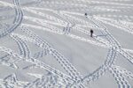 Artist Creates Phenomenal Snow Art That Look Like "Alien" Crop Circles