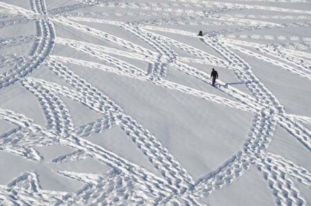 Artist Creates Phenomenal Snow Art That Look Like "Alien" Crop Circles