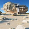 Architect Designs A House Inside A Giant Rock With A Modern Minimalist Look