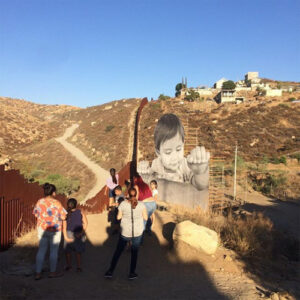 Artist JR Finishes His Mexico Border Installation With A Picnic ...