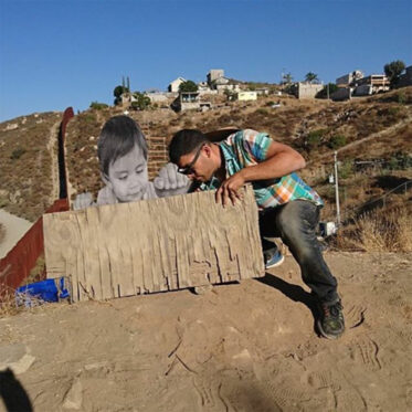 Artist JR Finishes His Mexico Border Installation With A Picnic ...