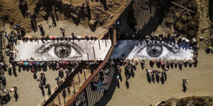 Artist JR Finishes His Mexico Border Installation With A Picnic ...