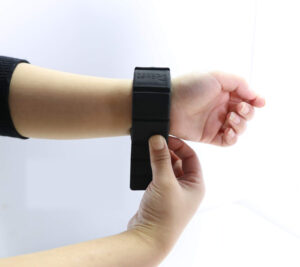 This Power Bank Wraps Around Your Wrist And Keeps Your Phone Charged ...