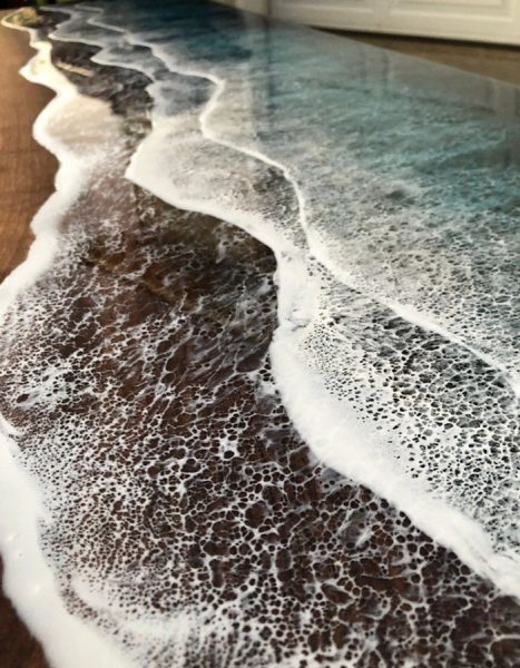 These Stunning Resin Tables Look Like Ocean Waves Washing Up On Shore