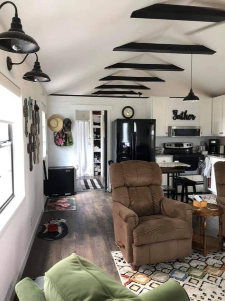 The 'We-Shed' Is A Pair Of His And Her Sheds Conjoined By A Deck