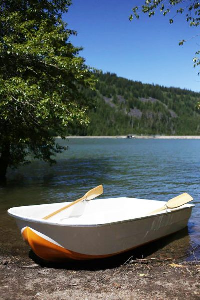 These Stylish Retro Campers Have Detachable Row Boats That Double As Roofs