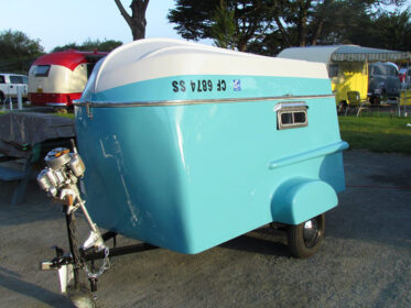 These Stylish Retro Campers Have Detachable Row Boats That Double As Roofs
