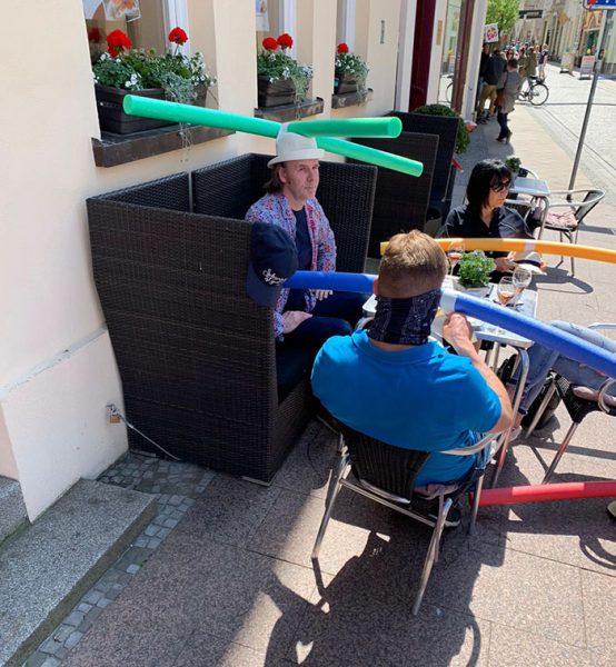 A Cafe In Germany Used Pool Noodle Hats To Ensure Social Distancing