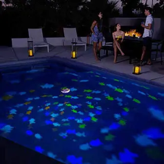 This Floating Projection Light Will Turn Your Pool Into A Glowing Aquarium