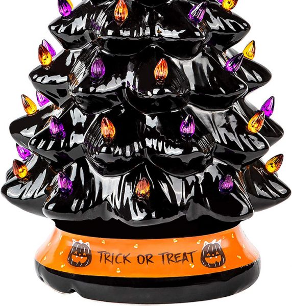 Celebrate Halloween With A Black Ceramic Tree Topped With A Spooky Pumpkin