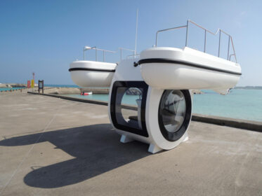 This Compact Boat Has A Built-In Mini-Submarine For Underwater Viewing