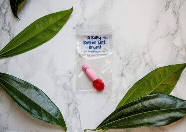 There's A Belly Button Lint Brush To Clean Out That Fluff