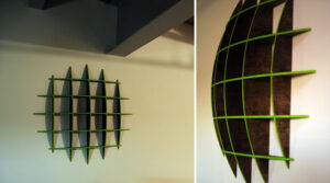 These 3D Sphere Bookshelves Look Like They're Emerging From Within The Wall