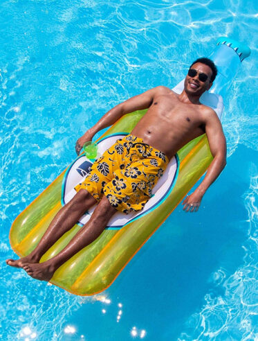 Relax With A Beer While Laying On A Beer Bottle Pool Float This Summer