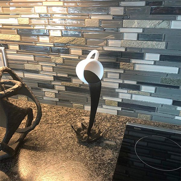 This Floating Coffee Cup Is A Stylish Addition To Anyone's Kitchen