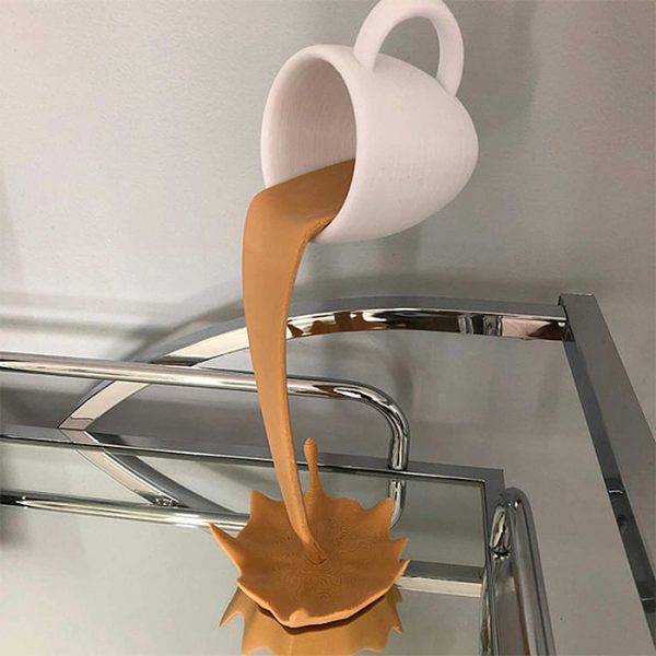 This Floating Coffee Cup Is A Stylish Addition To Anyone's Kitchen
