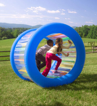 This Giant Inflatable Rolling Wheel Brings Fun And Exercise Together