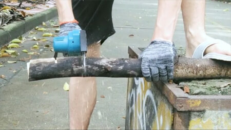 This Handheld Mini Chainsaw Makes Light Work Of DIY/Gardening Tasks